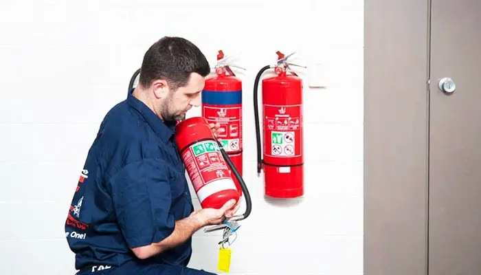 How often should fire extinguishers be inspected?